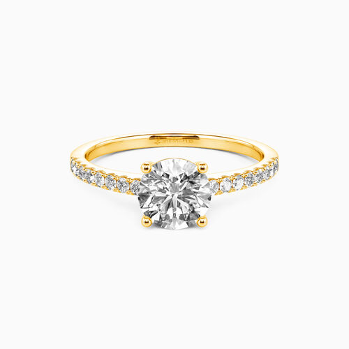 "Love is Light" 1ct Round Cut Side Stone Engagement Ring | She Said Yes